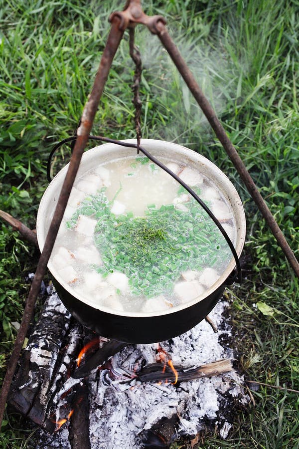 Cooking on a Fire in a Boiler Stock Photo - Image of bonfire, rest ...