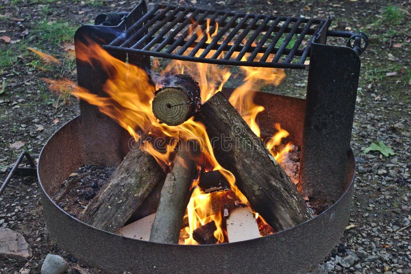 Cooking Fire in a Camp Fire Ring Stock Photo - Image of fire, flames ...