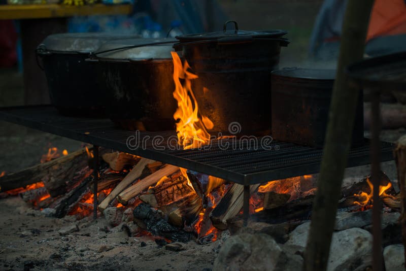 Cooking on a Fire in the Campaign Stock Photo - Image of barbecue ...