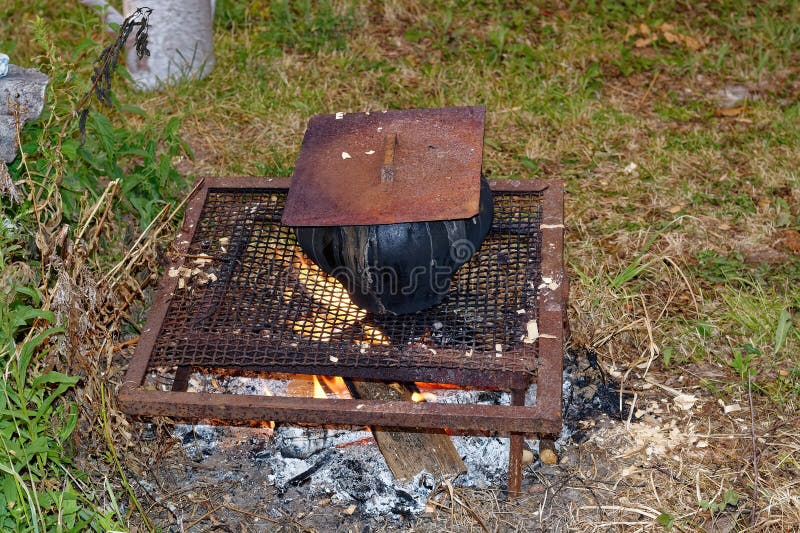 Cooking on a Fire in Cast Iron Stock Image - Image of metal, stove ...