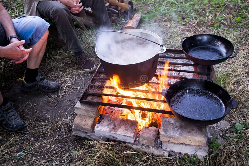 Cooking on a Fire in the Forest Stock Image - Image of prepare, people ...