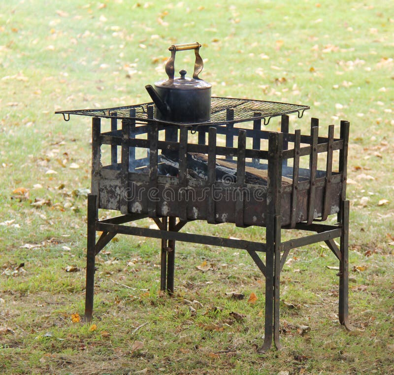 Cooking with fire wood. stock image. Image of burning - 58942269