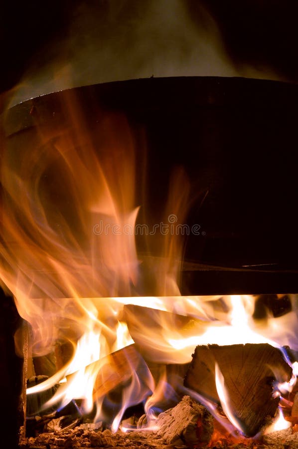 Cooking on fire stock photo. Image of cook, bake, flame - 34228378