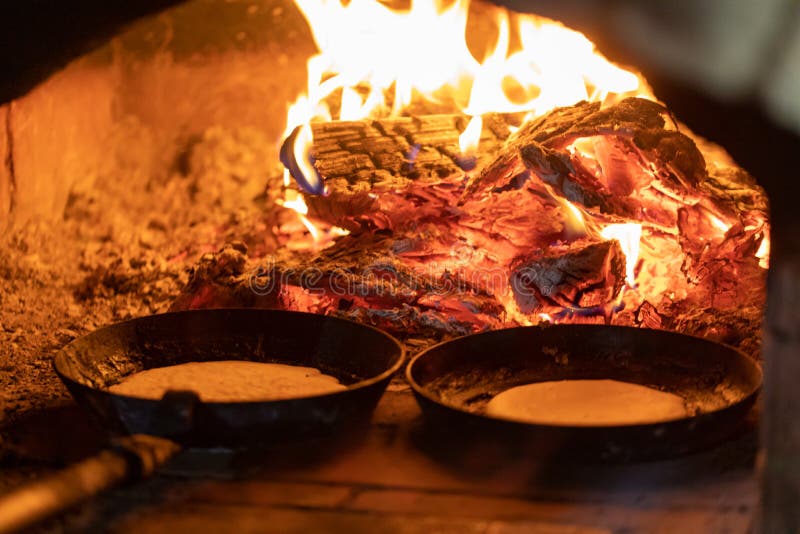 Cooking on fireplace stock image. Image of appetizing - 35966985