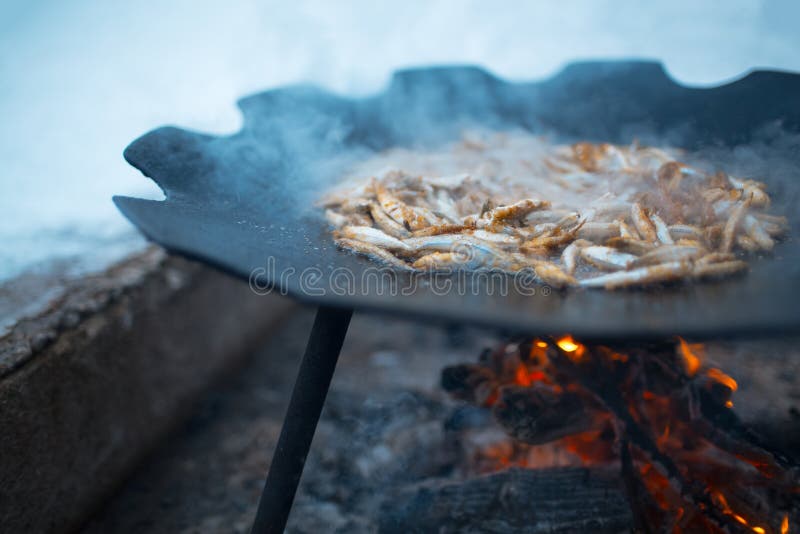 Cooking Fish in a Flat Pan on the Bonfire Outdoor of Winter Stock Photo ...