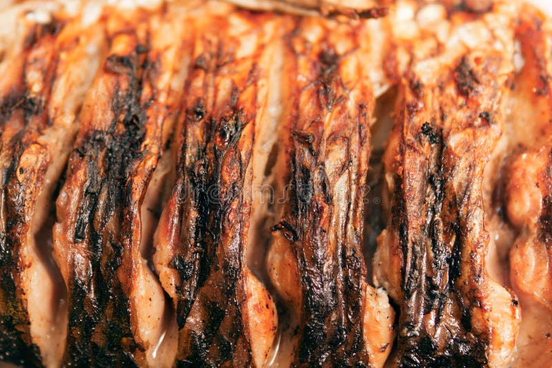 Cooking Fish on the Grill. Fried Fish. Fried Fish on the Fire. Close-up ...