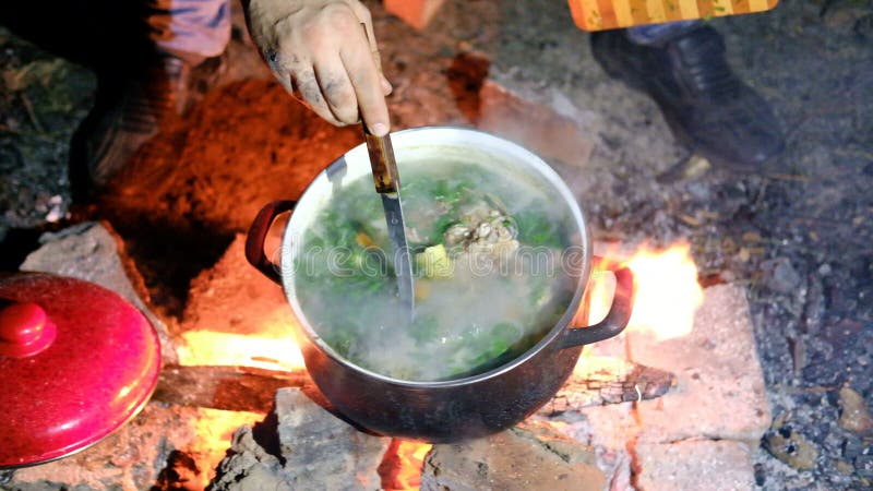 Cooking Fish Soup Over a Fire Stock Footage - Video of fish, campfire ...