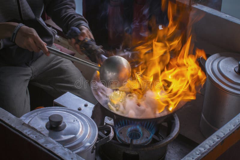 Cooking Flame on the Top of a Wok Stock Image - Image of cooker, motion ...