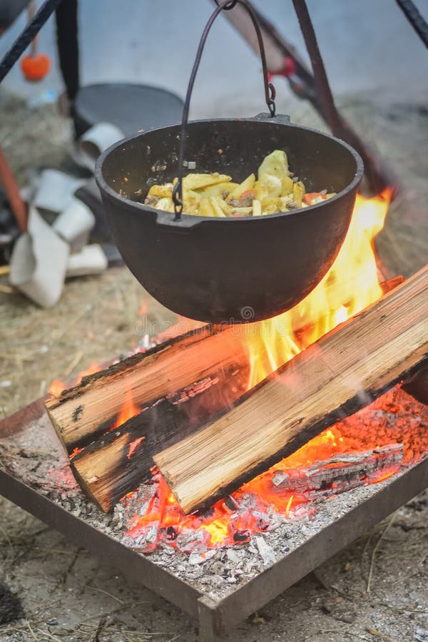 Cooking Food on a Fire in a Cauldron Stock Image - Image of cauldron ...