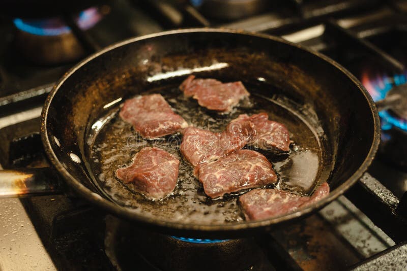 Cooking Food in the Kitchen Stock Photo - Image of roast, grease: 76877770