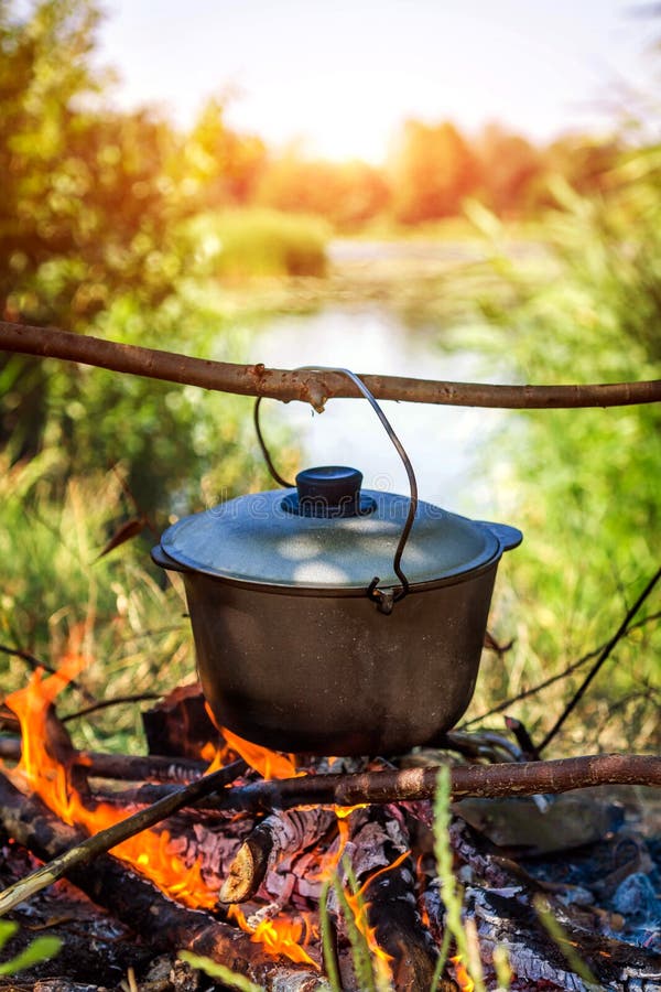 Cooking Food in a Pot on Campfire Stock Photo - Image of gulasch, boil ...