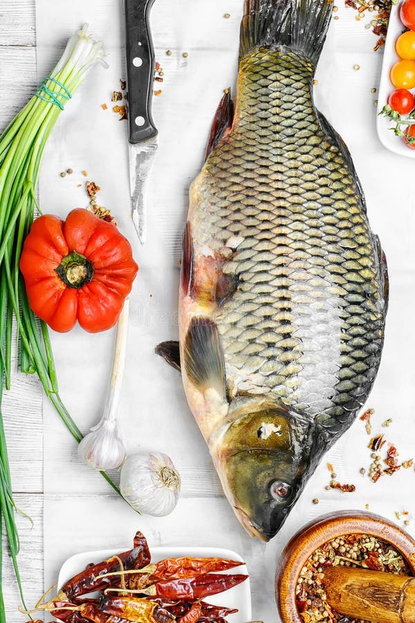 Cooking fresh carp stock image. Image of vegetable, spice - 75884681