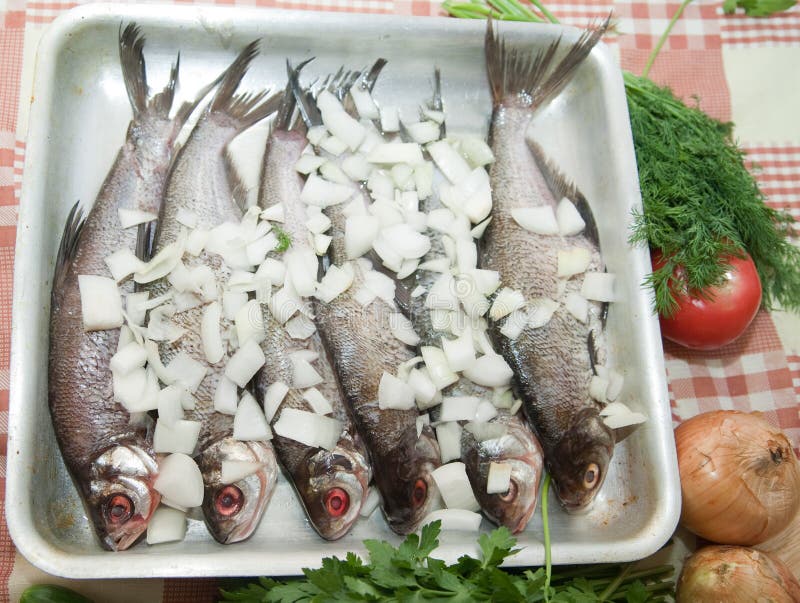 Cooking a fresh fish stock image. Image of meal, fish - 13706797