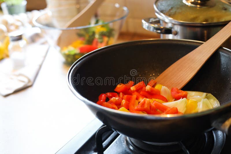 Cooking Fresh Vegetables in Frying Pan on Stove, Closeup. Space for ...