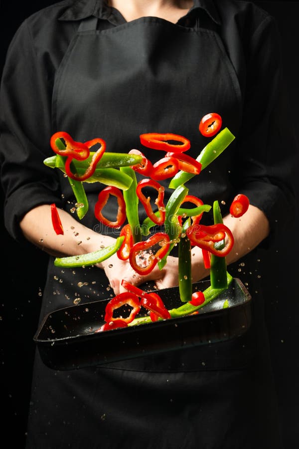 Cooking Fresh Vegetables in the Pan Chef. Vertical Viewing of Photos ...