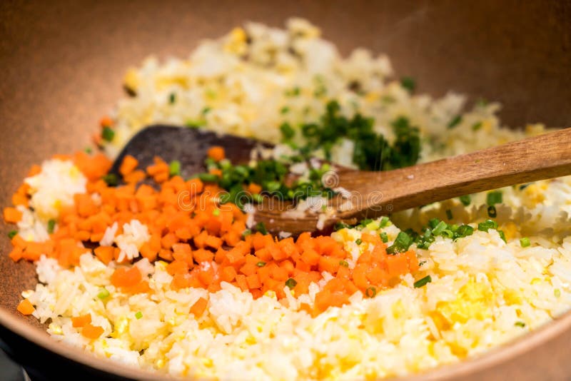 Cooking fried rice stock photo. Image of kitchen, rice - 129528094