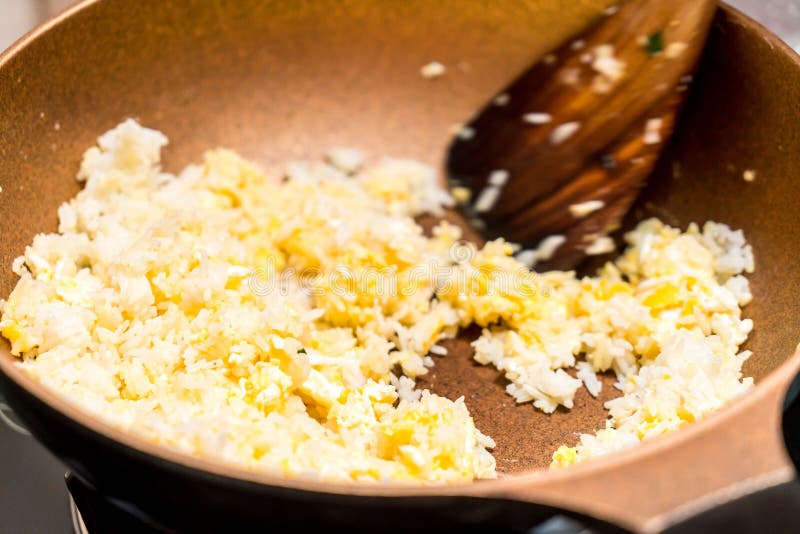 Cooking fried rice stock image. Image of meal, onion - 129528631