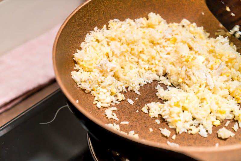 Cooking fried rice stock image. Image of frying, kitchen - 145106105
