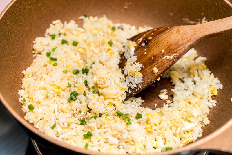 Cooking fried rice stock photo. Image of biryani, fast - 149610736