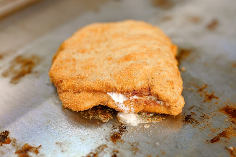 Cooking and Frying Cordon Bleu on the Stove in a Restaurant Kitchen ...
