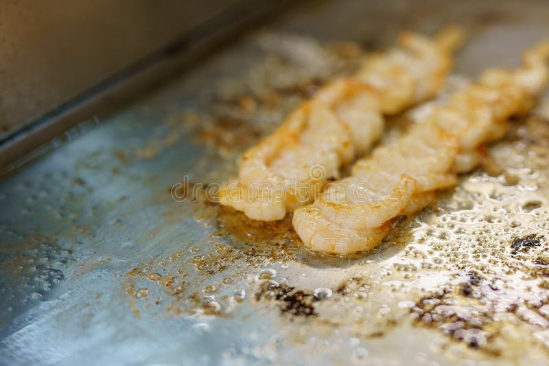 Cooking and Frying Shrimp on a Stick in a Restaurant Kitchen Stock ...