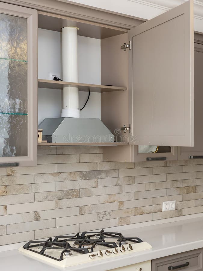 Cooking Gas Stove with Hood in Modern Kitchen. Stock Photo - Image of ...