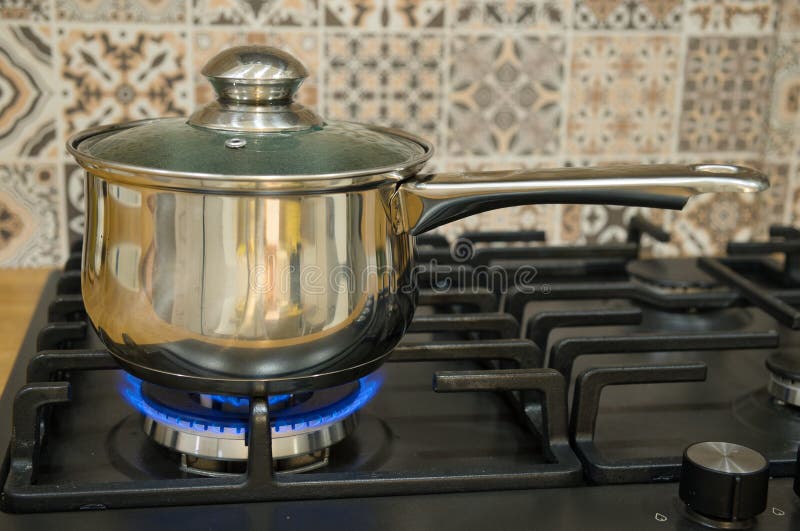 Cooking on a Gas Stove. the Pot on Gas Burner Stock Image - Image of ...