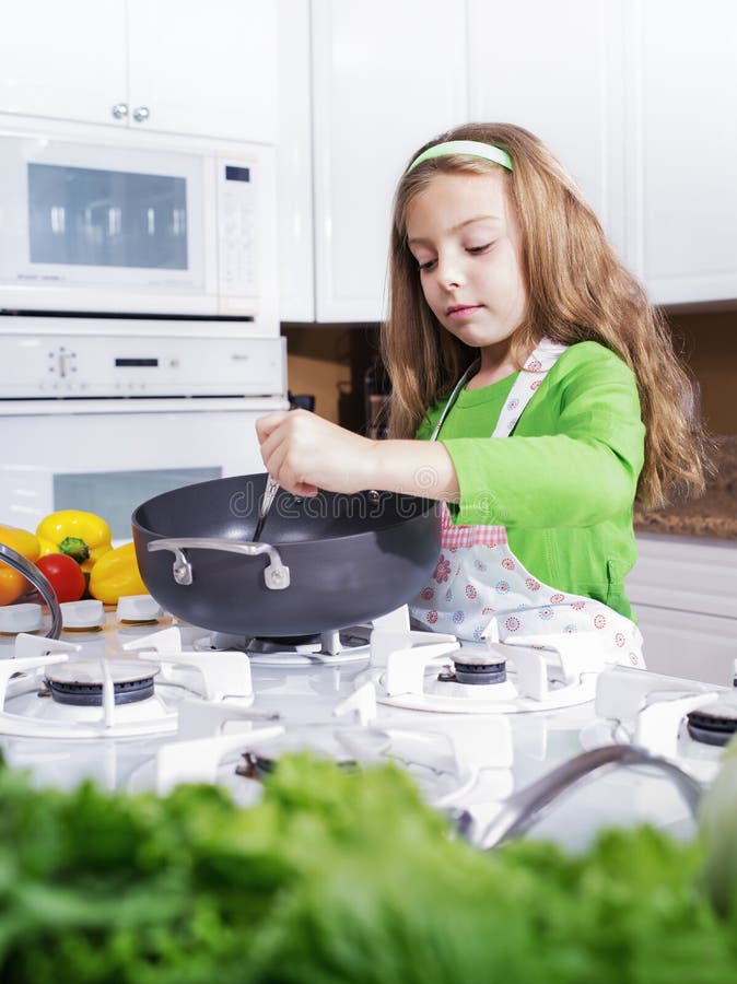 Cooking girl stock image. Image of home, cute, pretty - 58922889