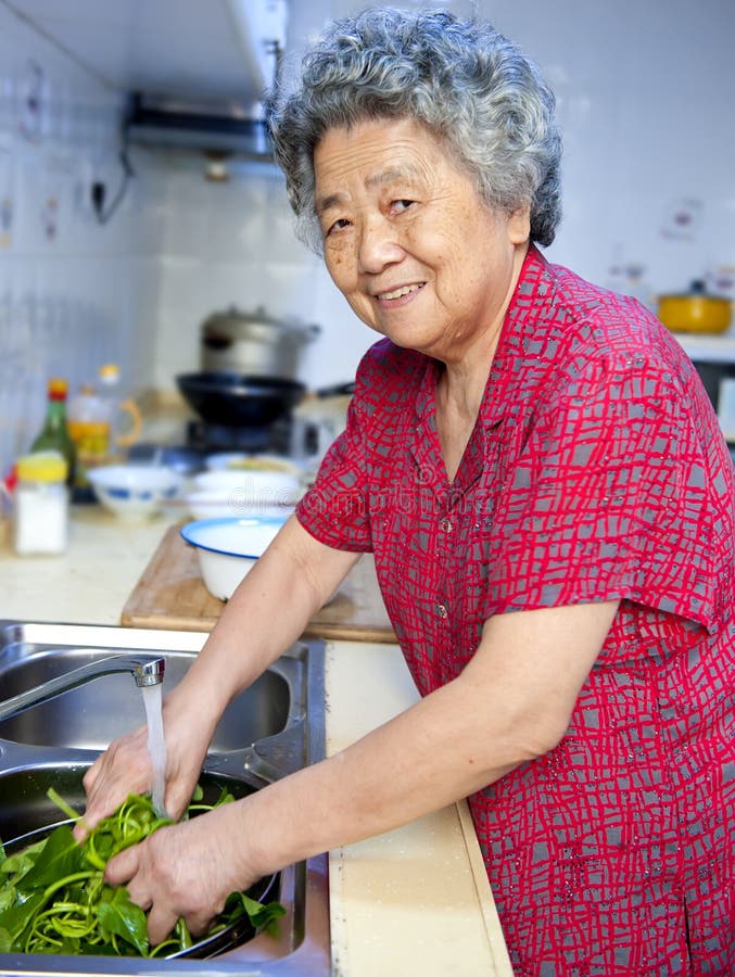 Cooking grandmother stock image. Image of cheerful, female - 17147705