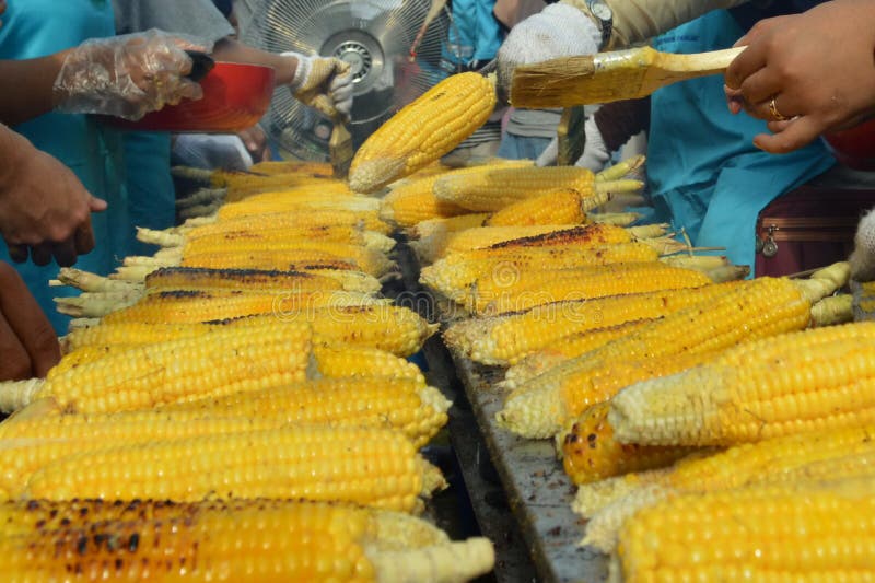 Cooking Grilled Corn Together Stock Photo - Image of roasted, snack ...