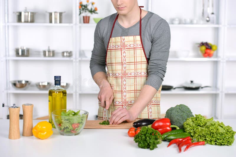 Handsome Man Cooking in Kitchen at Home Stock Photo - Image of indoors ...