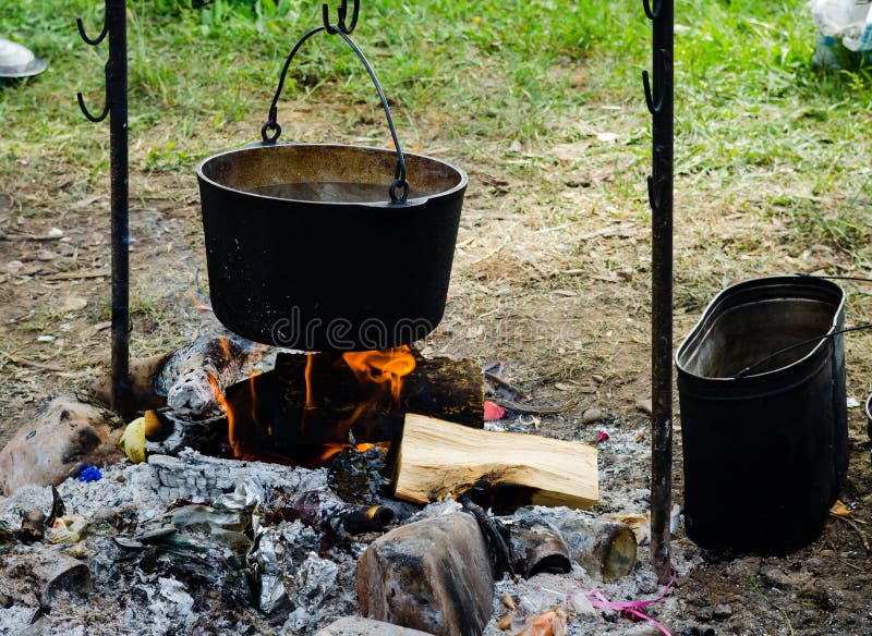 Cooking in a Hike in the Cauldron Hanging Over the Fire Stock Photo ...
