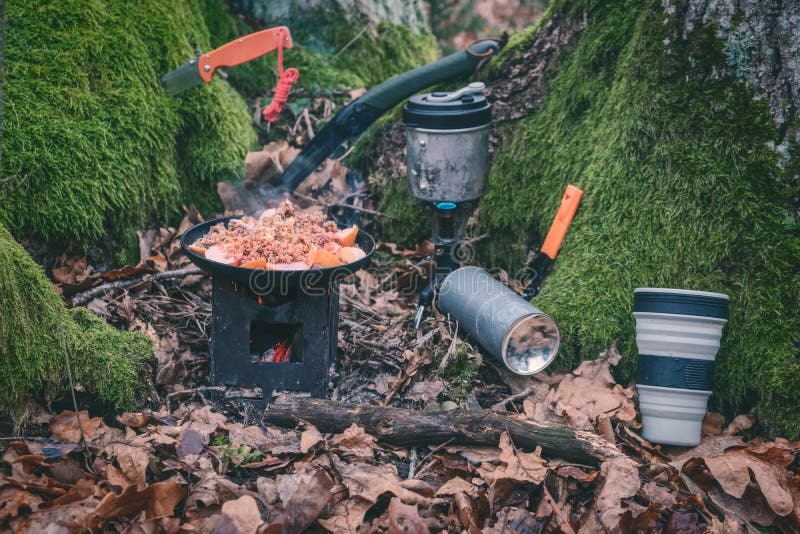 Cooking while Hiking with a Backpack Stock Photo - Image of survival ...