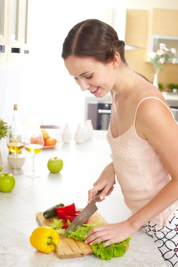Cooking at home stock photo. Image of brunette, cucumber - 22926498