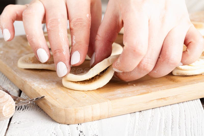 Cooking and Home Concept - Close Up of Hands Making Cookies from Fresh ...