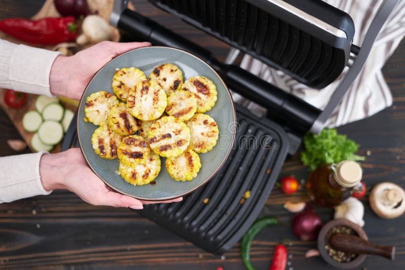Cooking at Home on Electric Grill - Sliced Corn Cobs Stock Photo ...