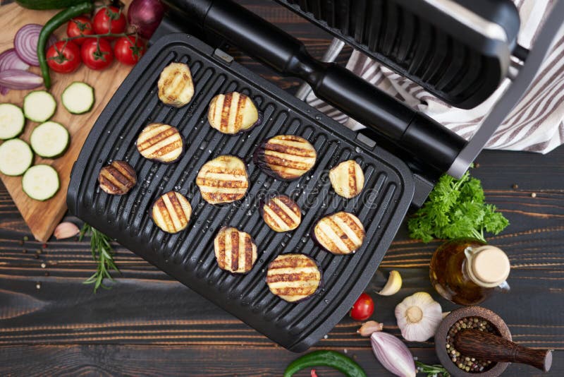 Cooking at Home on Electric Grill - Zucchini and Eggplant Stock Photo ...