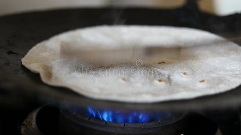 Cooking Homemade Roti Chapati on a Pan Stock Video - Video of ...