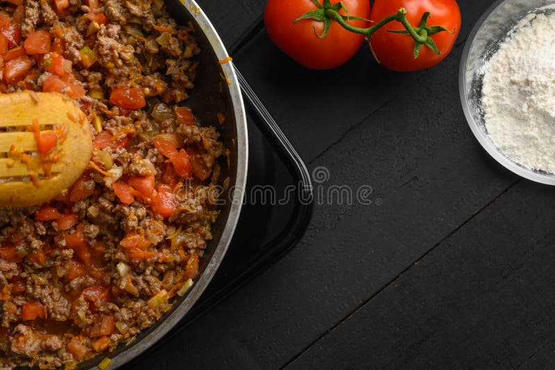 Cooking Italian Lasagna, Frying in a Skillet Dressing. Background for ... Cooking Italian Lasagna, Frying in a Skillet Dressing. Background for ...