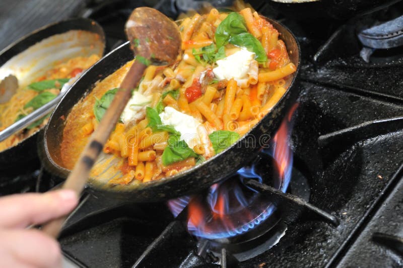 Cooking italian pasta stock image. Image of pepper, stirring - 4000627