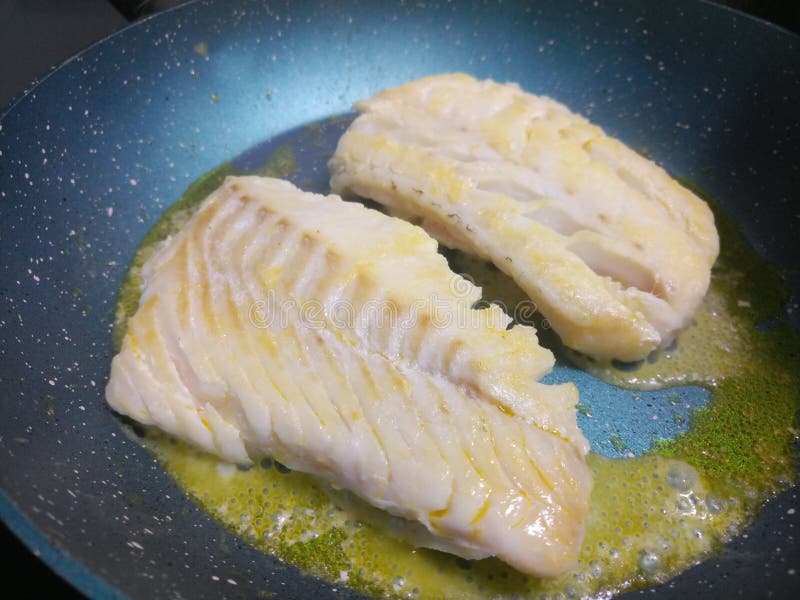 Sizzling Hot Cod Fillet in a Pan Stock Image - Image of fillet, cooking ...