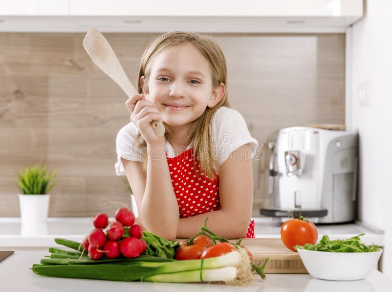 Beautiful Little Girl Cooking in the Kitchen Stock Image - Image of ...