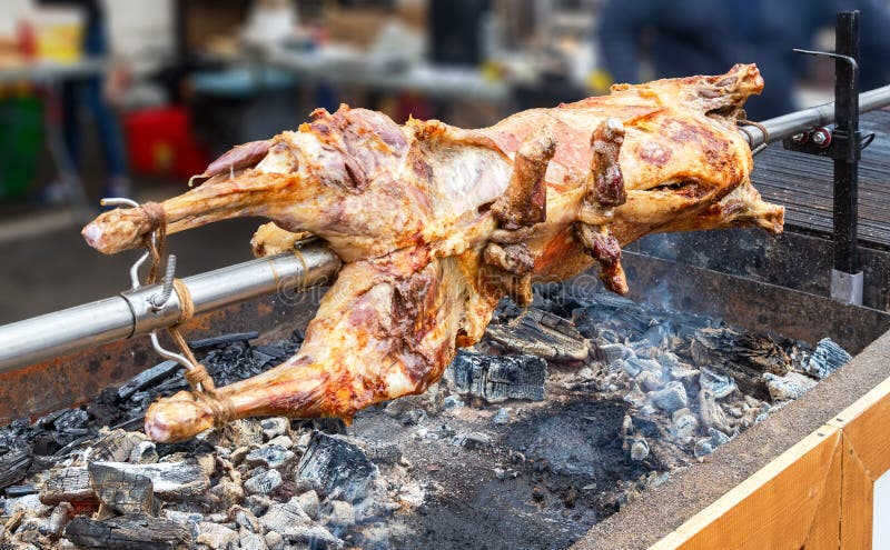 Cooking Lamb Carcass on a Spit Over Hot Charcoals Stock Image - Image ...