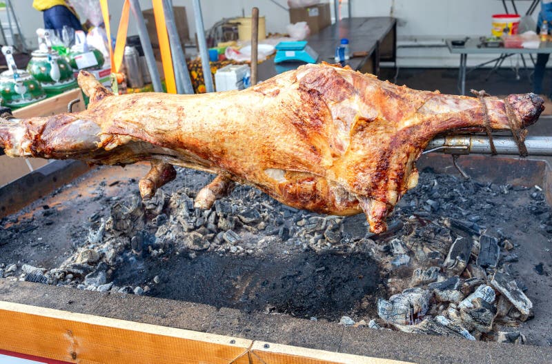 Cooking Lamb Carcass on a Spit Roasted on the Open Fire Stock Image ...