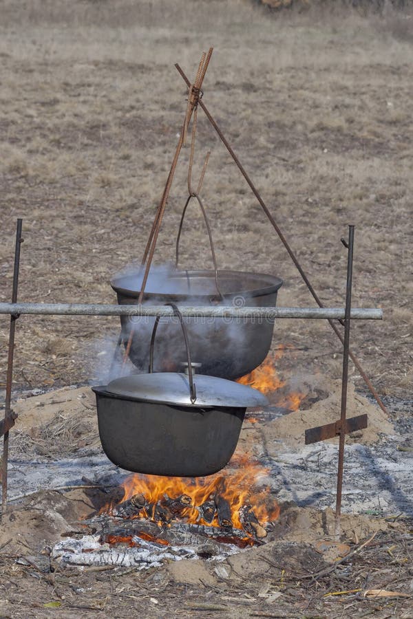Cooking in Large Cauldrons on the Fire Stock Photo - Image of firewood ...