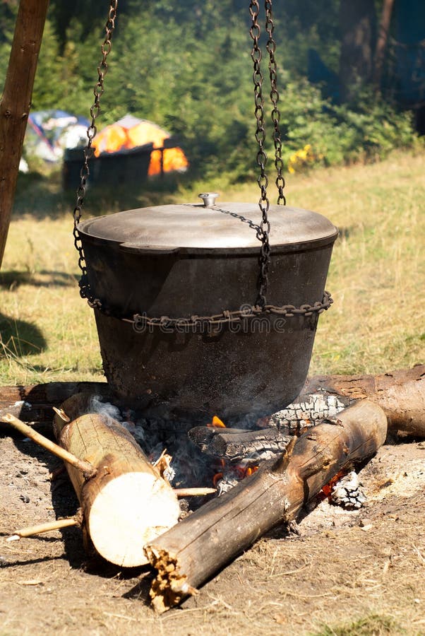 Cooking in a Large Pot on the Fire. Stock Image - Image of fire ...