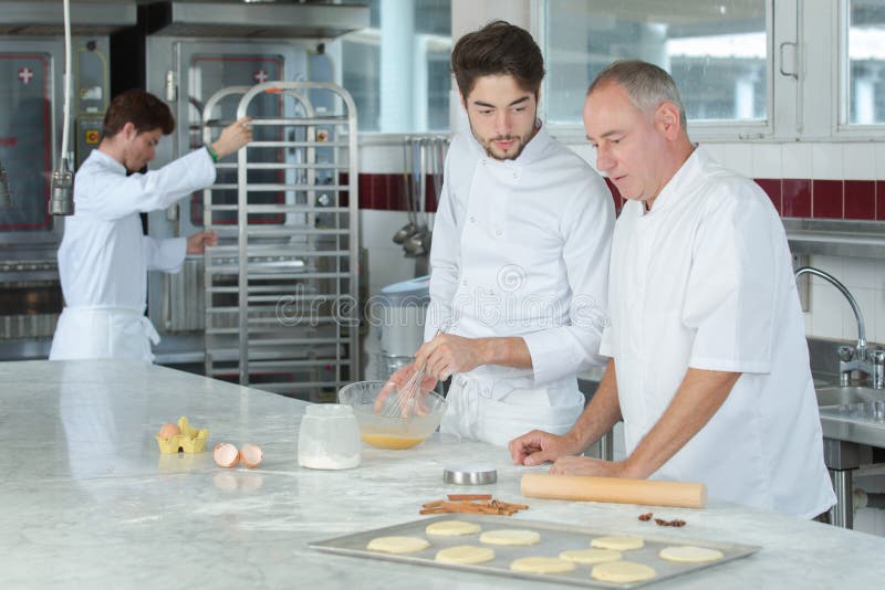 Cooking lessons from best stock photo. Image of colleague - 103745510