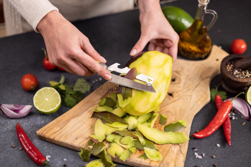 Cooking Mango Salsa - Woman Peeling Mango Fruit Stock Image - Image of ...