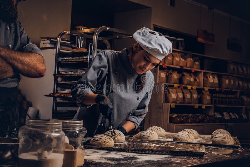 Cooking Master Class in Bakery. Chef with His Assistant Showing Ready ...