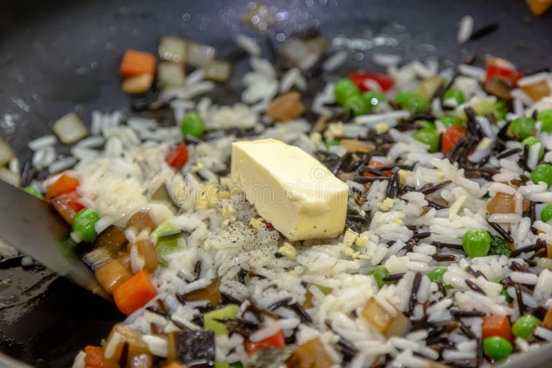 Cooking Meat Cut into Small Pieces in a Frying Pan with Vegetables ...